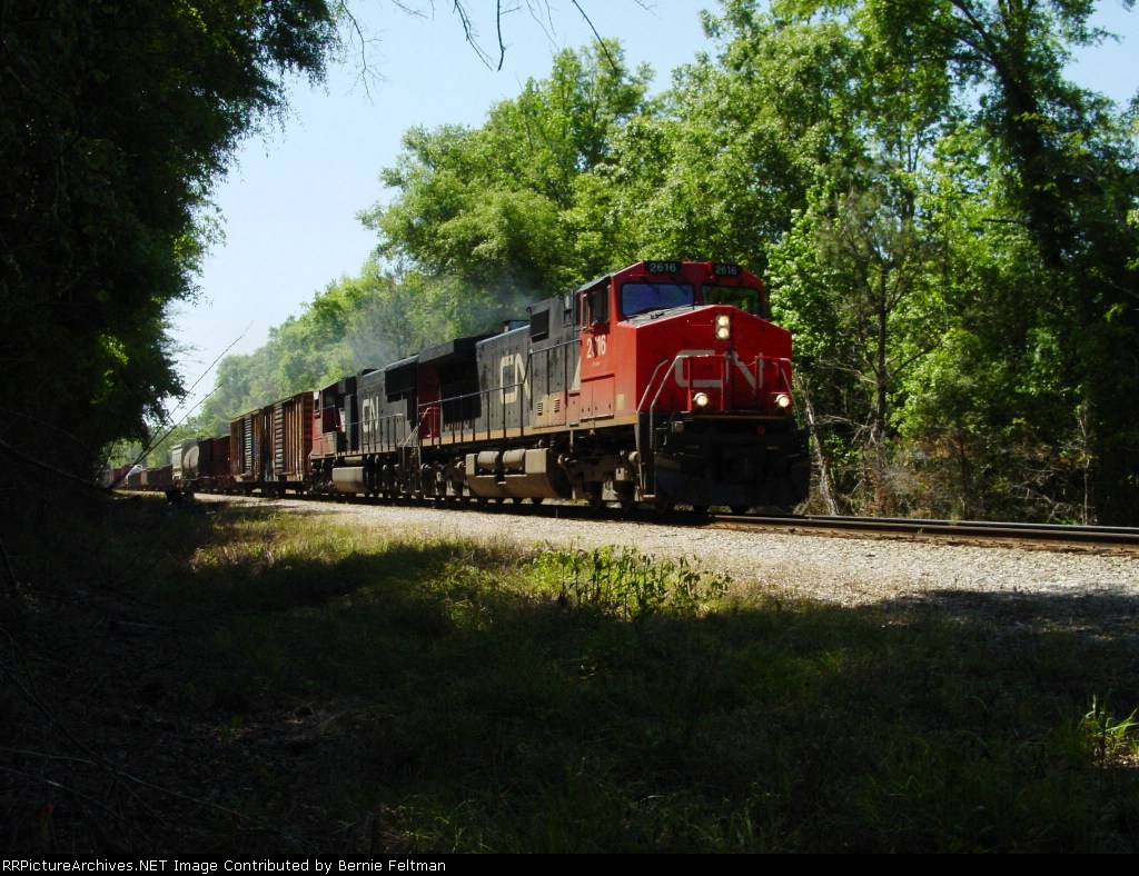 CN 2616 (C44-9W) leading Q 650-27 northbound
